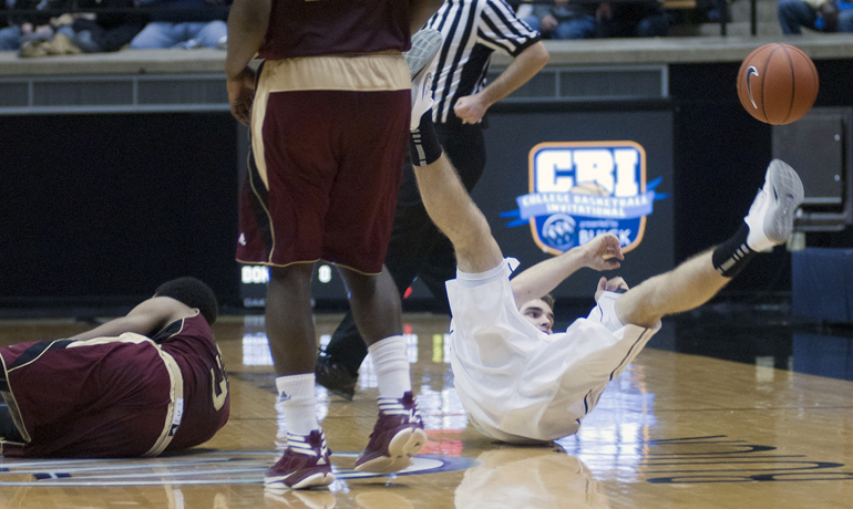 Purdue guard Dru Anthrop (right) falls after trying to chase down a ...